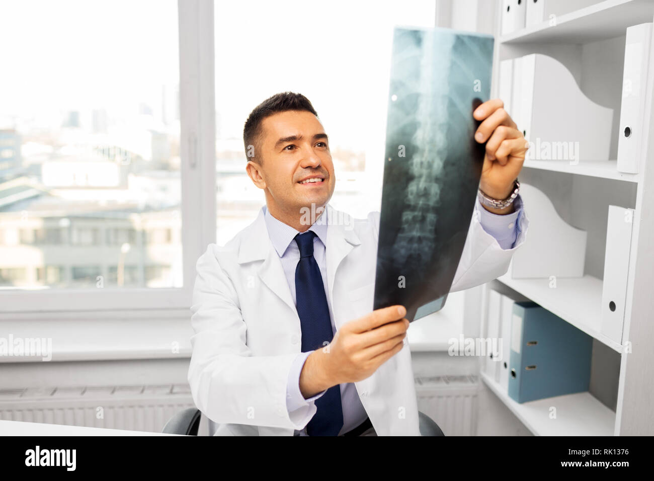 doctor with x-ray scan at hospital Stock Photo - Alamy