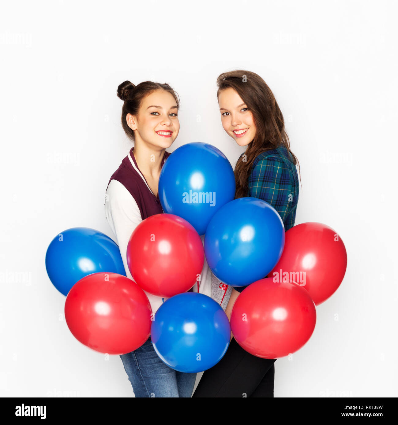 happy teenage girls with helium balloons Stock Photo - Alamy