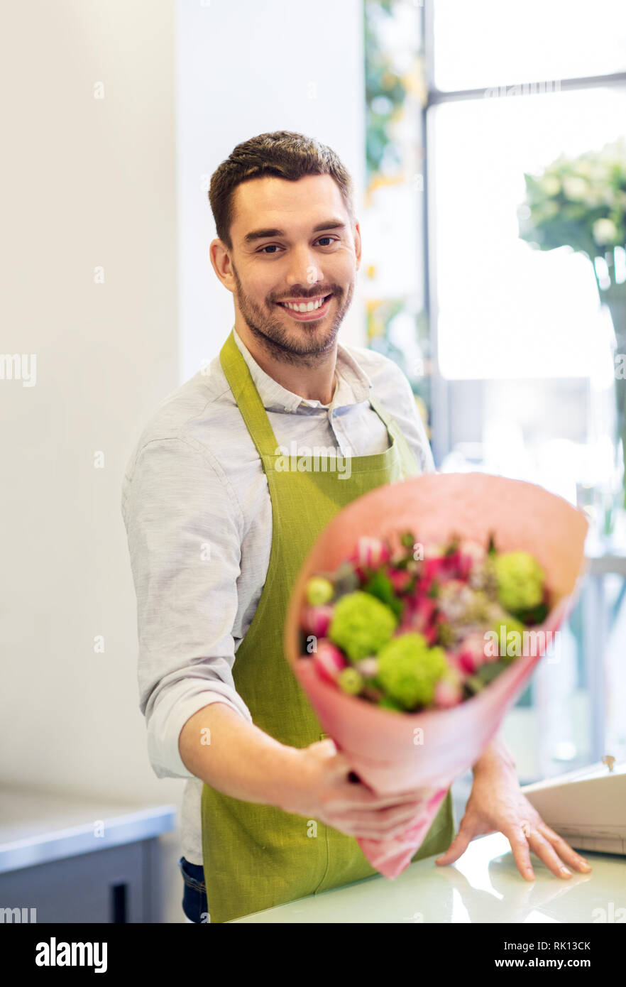 Smiling shop owner wrapped hi-res stock photography and images - Alamy