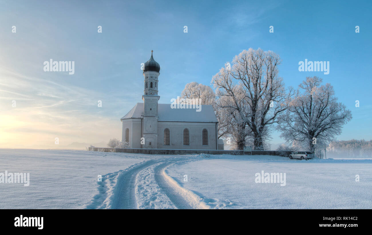 Winter landscape with isolated church Stock Photo - Alamy
