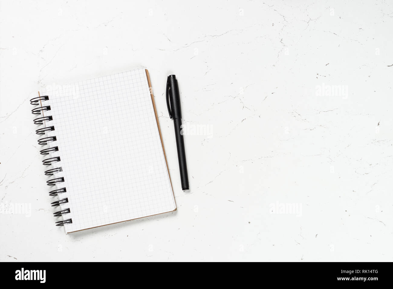 Notepad and pen on white Stock Photo - Alamy