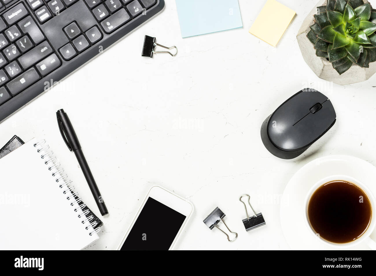 Office desk on white top view Stock Photo - Alamy