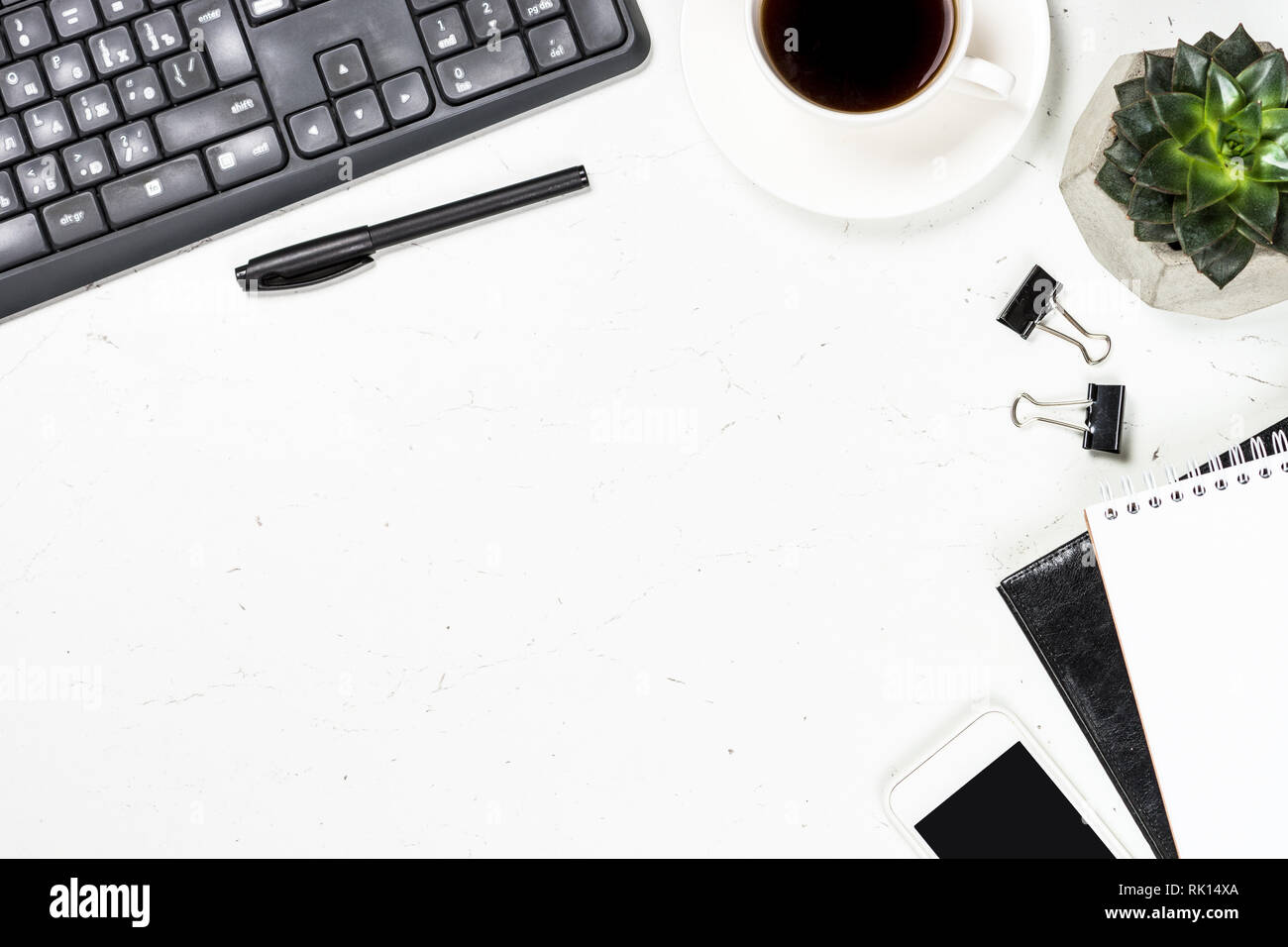 Office desk on white top view Stock Photo - Alamy