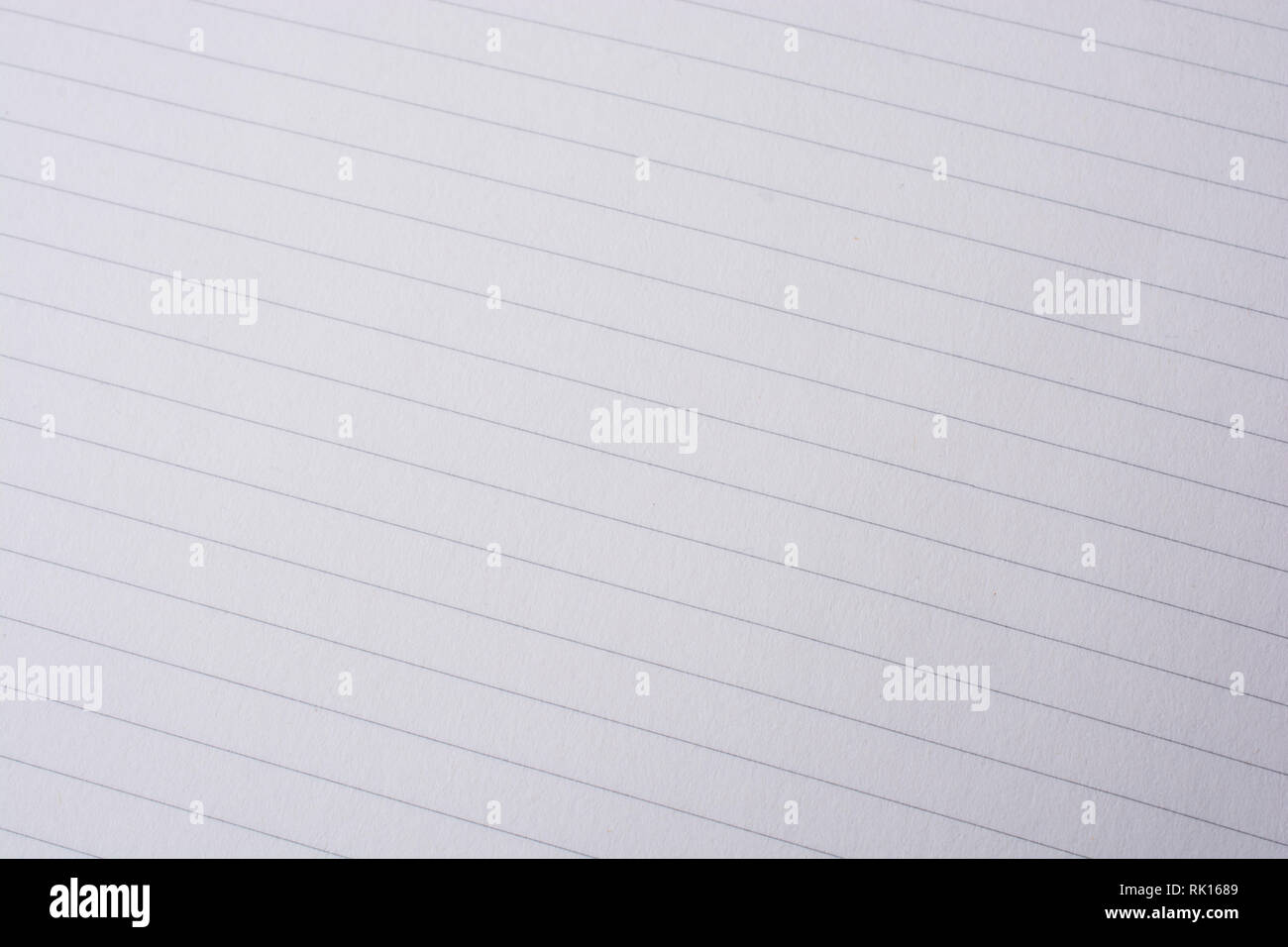 White note book paper with line in view Stock Photo - Alamy