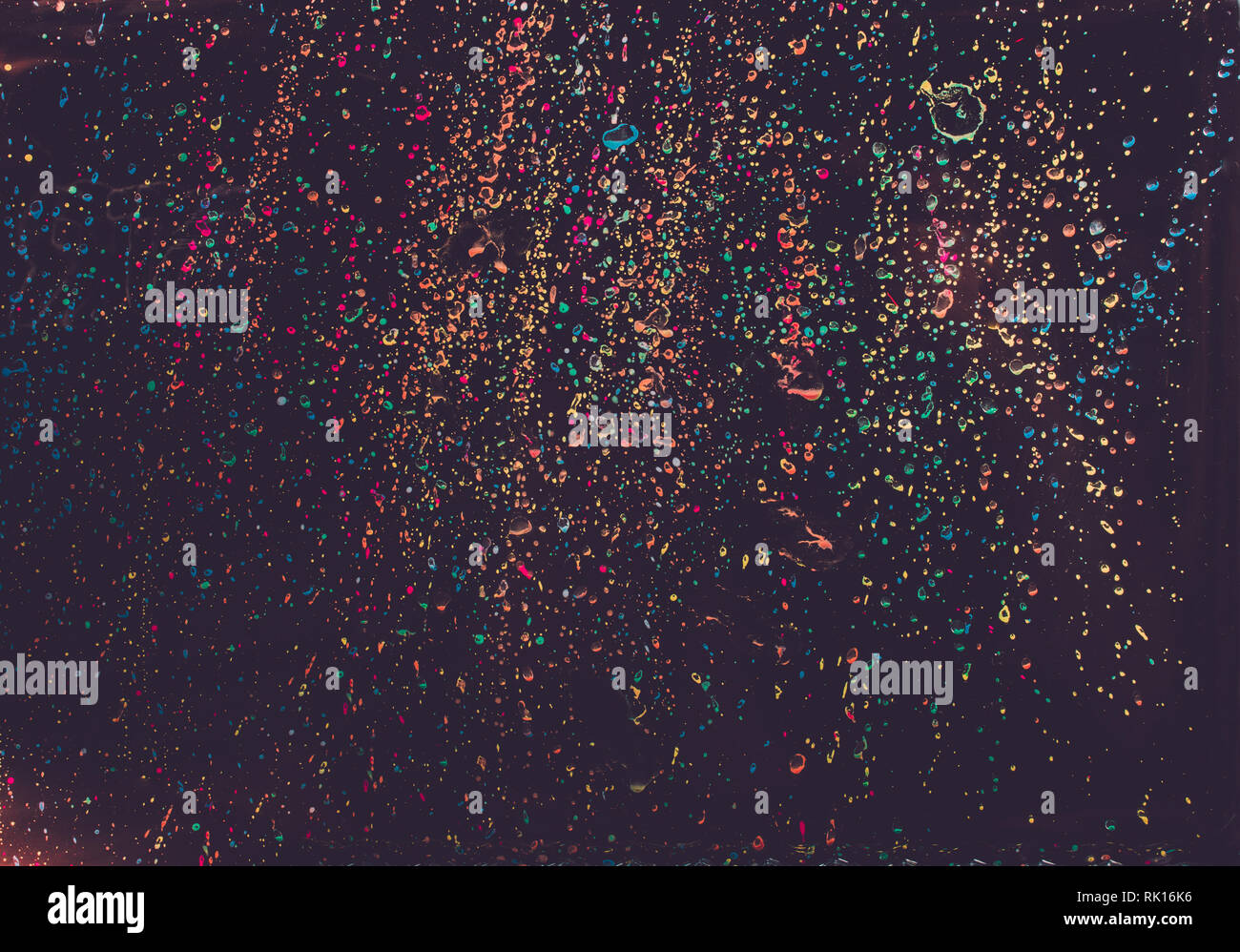 Paint splash effect on a glass on a black background Stock Photo - Alamy