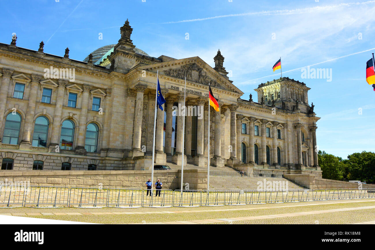 German flags flying on the historic building with glass dome hi-res ...