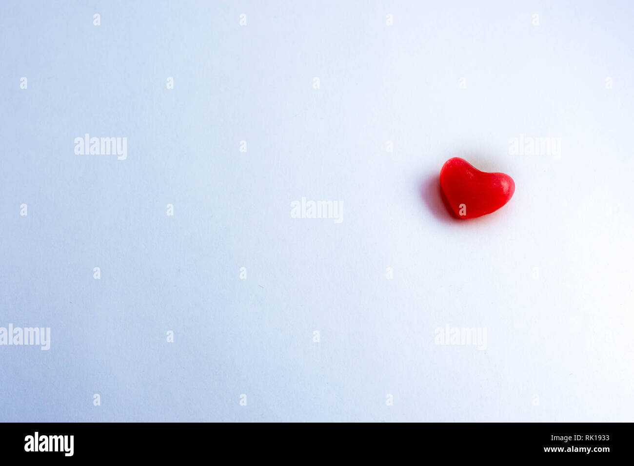 Candy Love red heart Stock Photo - Alamy