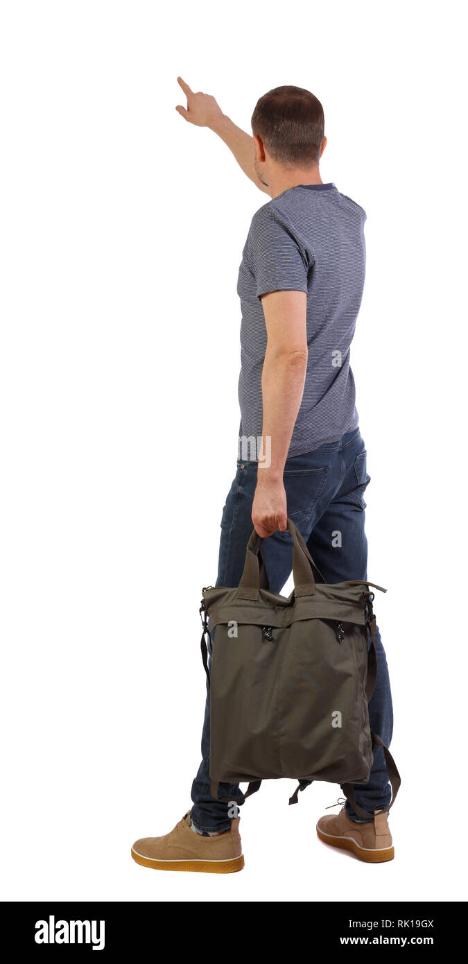 Back view of a man with a green backpack pointing forward. backside ...