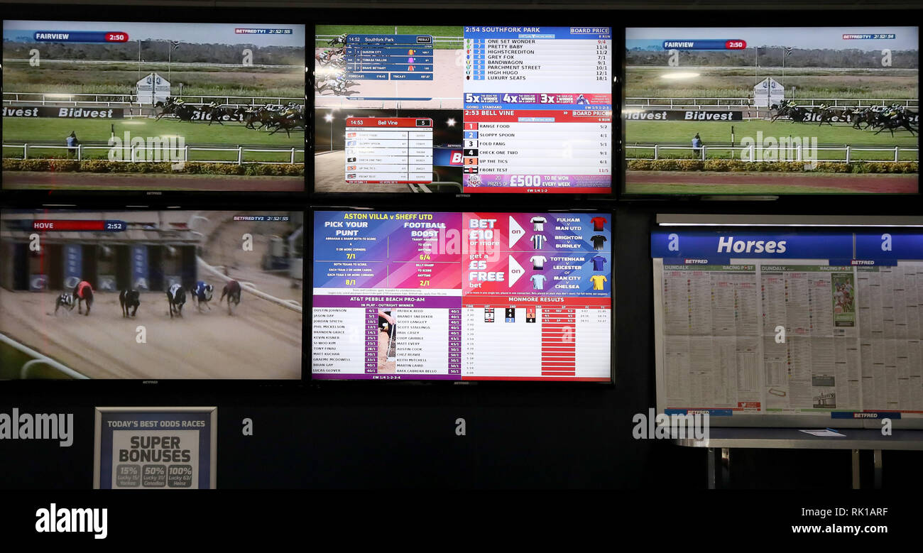 Racing from around Europe on tv screens at a Betfred store in ...