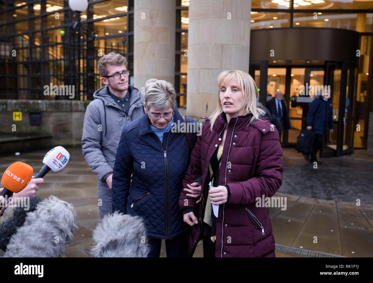 Margaret Hanlon (centre) and Lynne Bryce, the mother and sister of ...