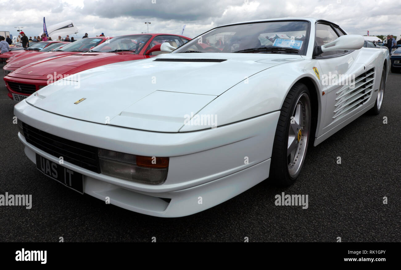 Three-quarters front view of a white, 1990, Ferrari Testarossa on ...