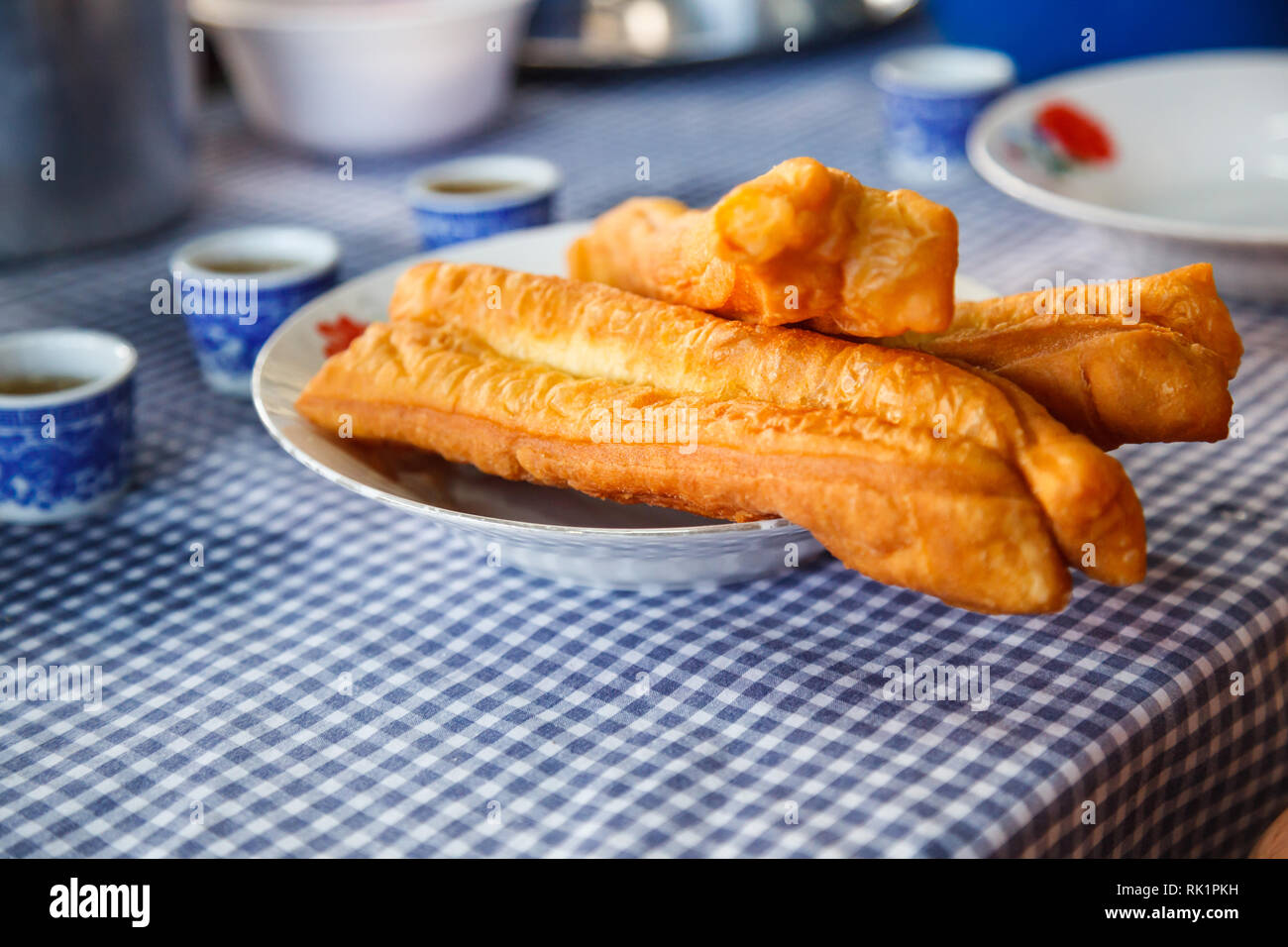 Youtiao (Chinese fried churro, Chinese cruller, Chinese oil stick ...