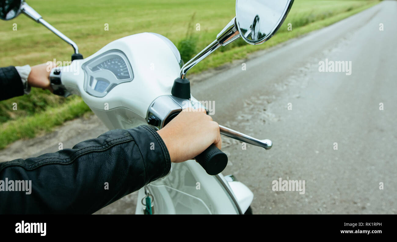 Person riding moped hi-res stock photography and images - Alamy