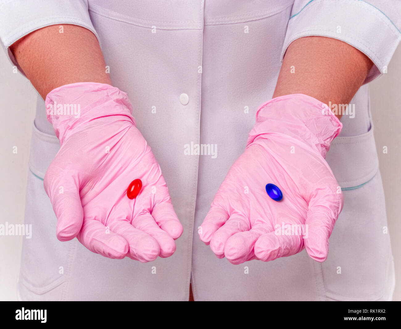 Difficult Choice between drugs and Placebo. Doctor holds pills ...