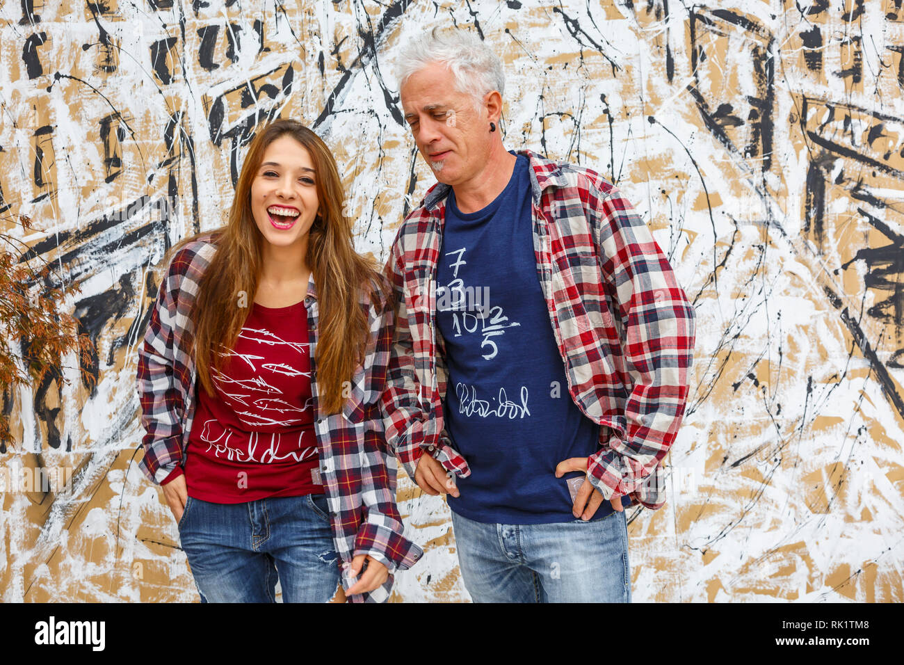 Two people posing Stock Photo - Alamy