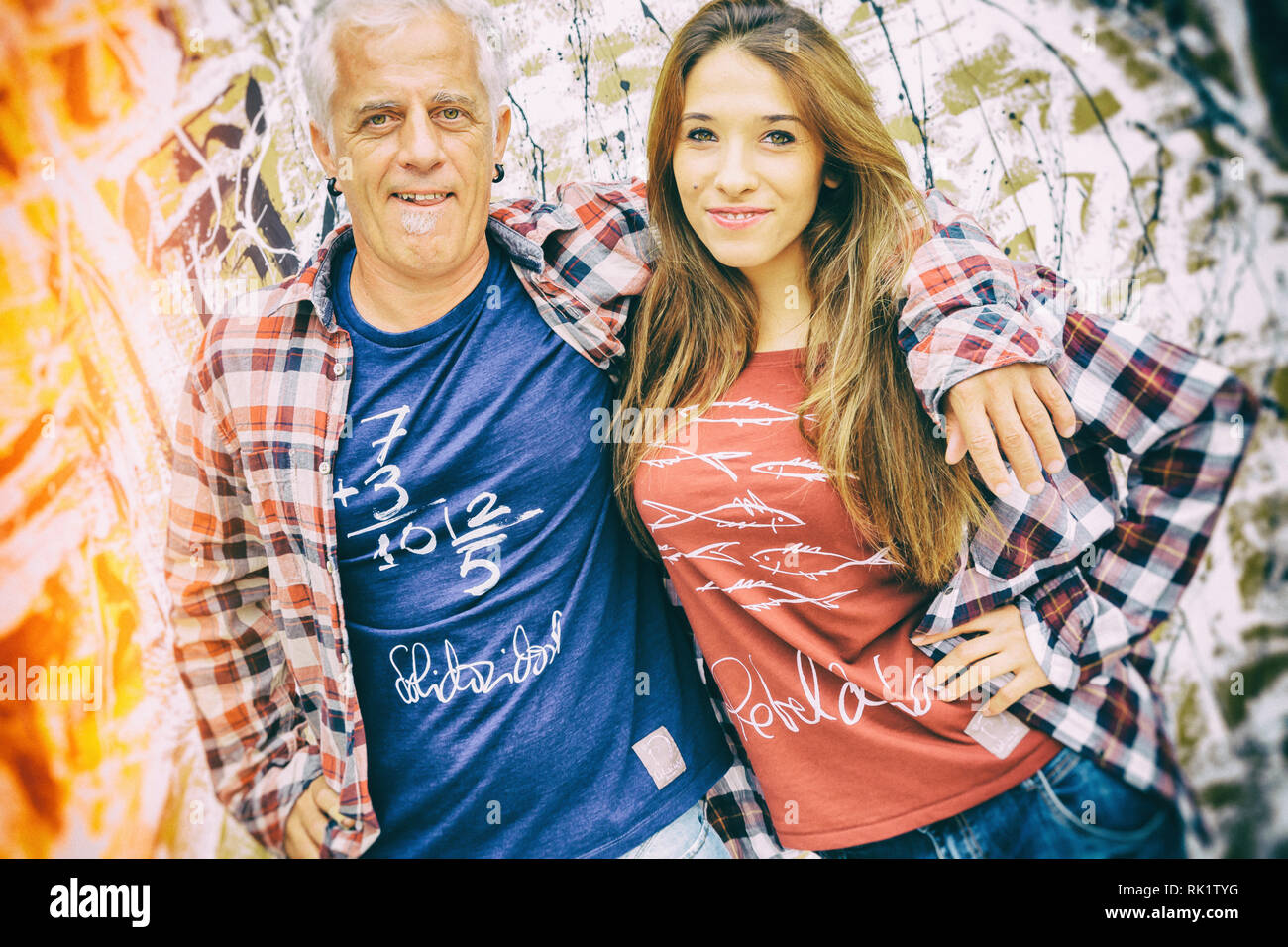 Two people posing Stock Photo - Alamy