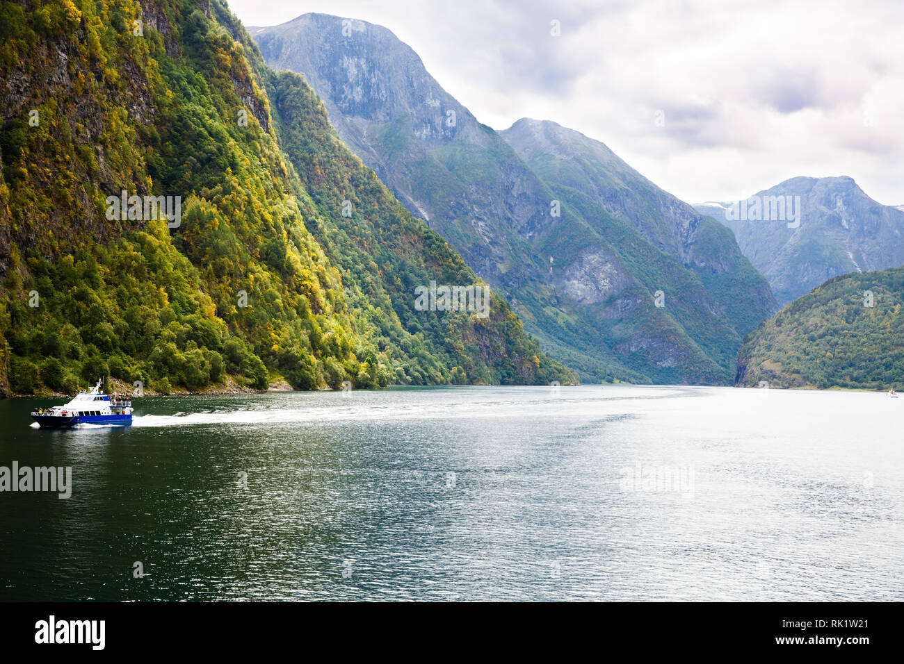Landscape with Naeroyfjord and high mountains in Norway Stock Photo - Alamy