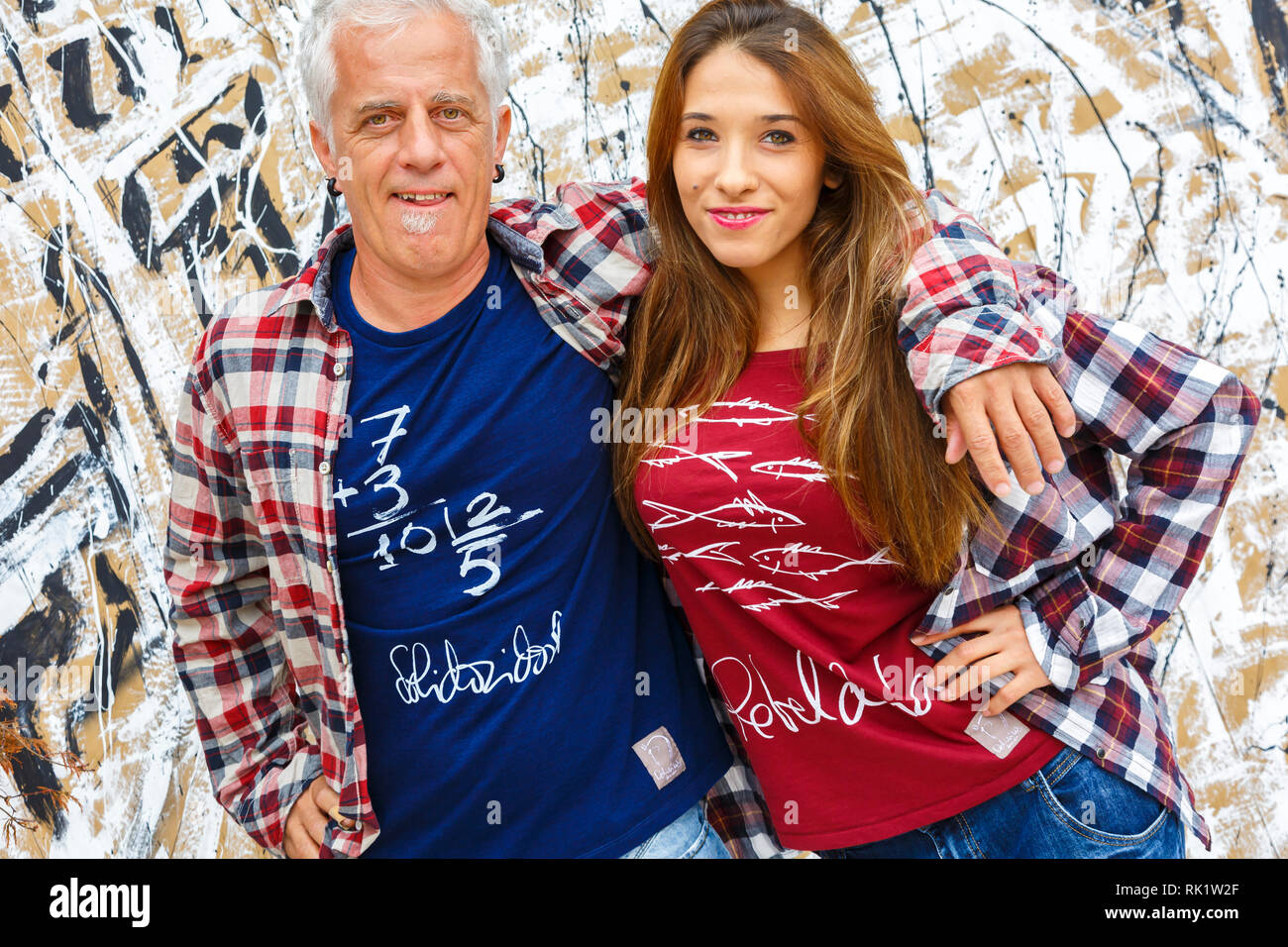 Two people posing Stock Photo - Alamy