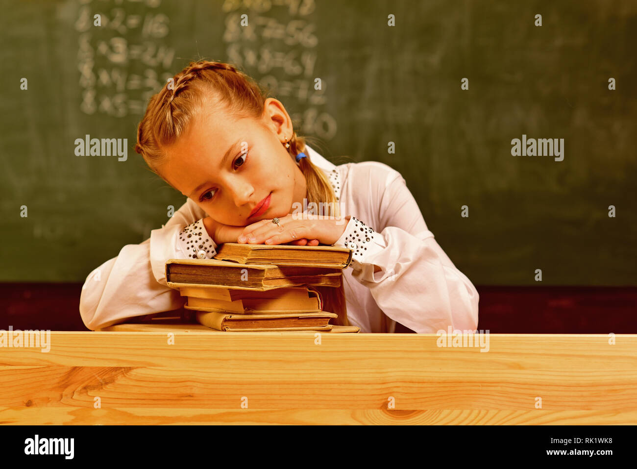 tired girl. tired girl at school lesson. tired girl prepare to exam ...