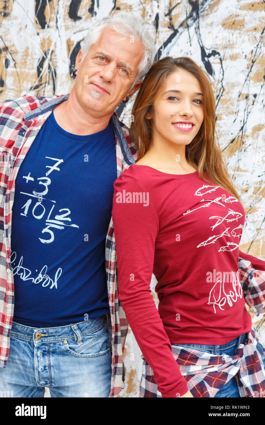 Two people posing Stock Photo - Alamy