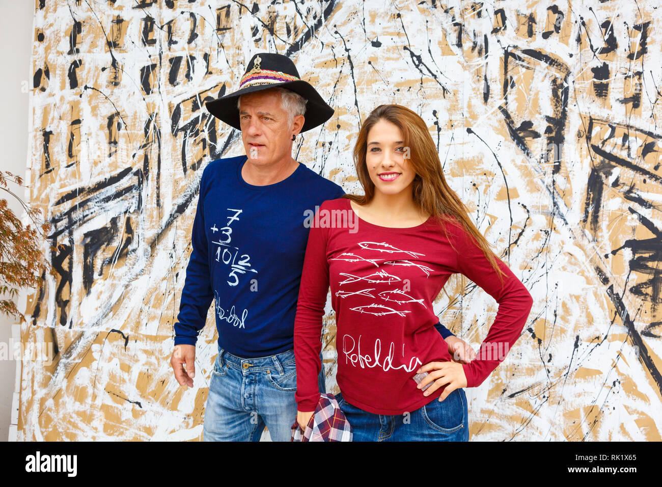 Two people posing Stock Photo - Alamy