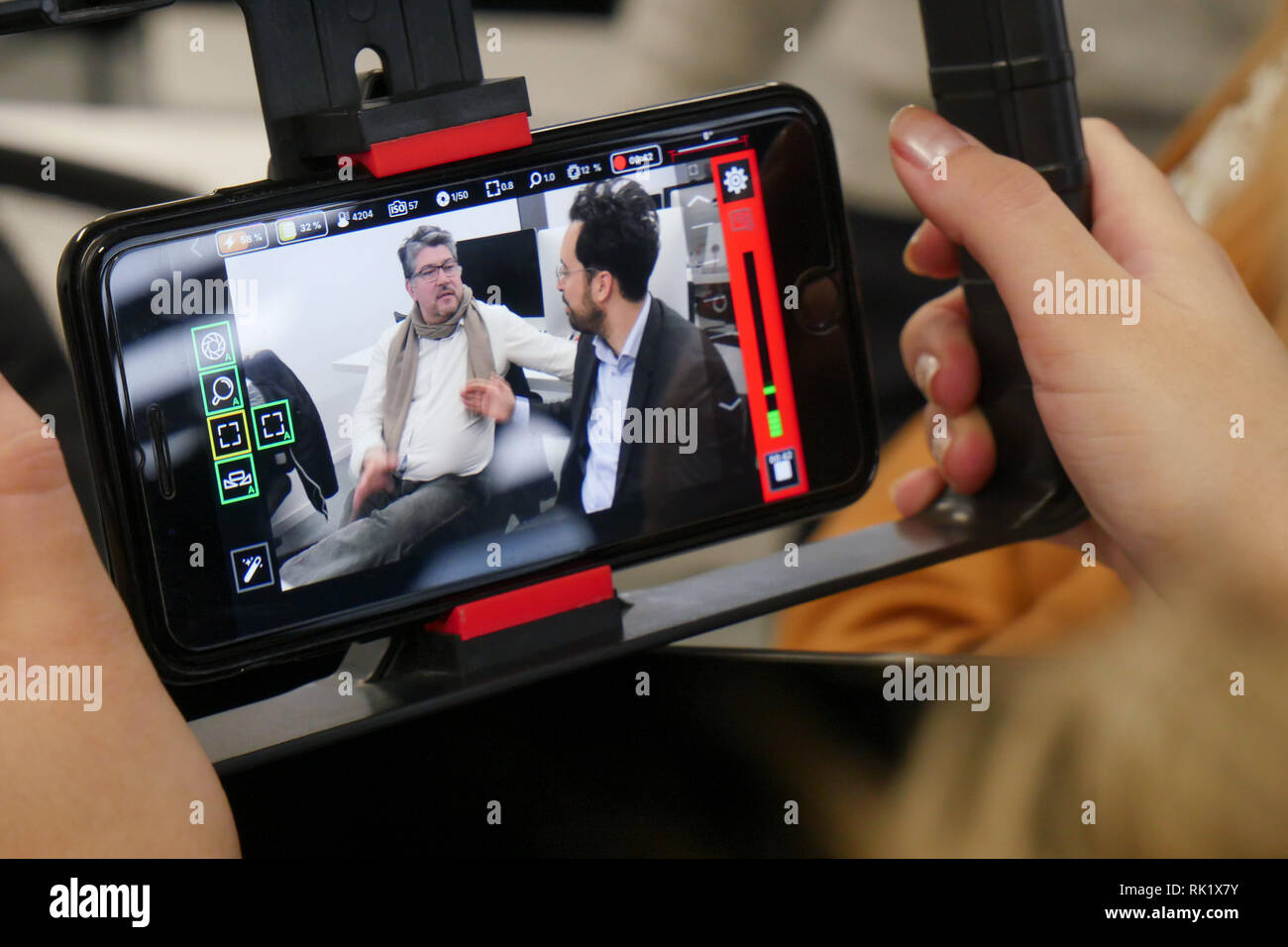 Filming with a mobile phone, Lyon, France Stock Photo - Alamy