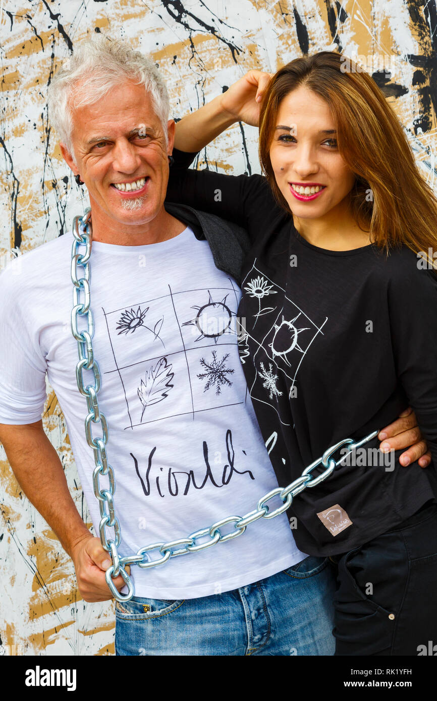 Two people posing Stock Photo - Alamy