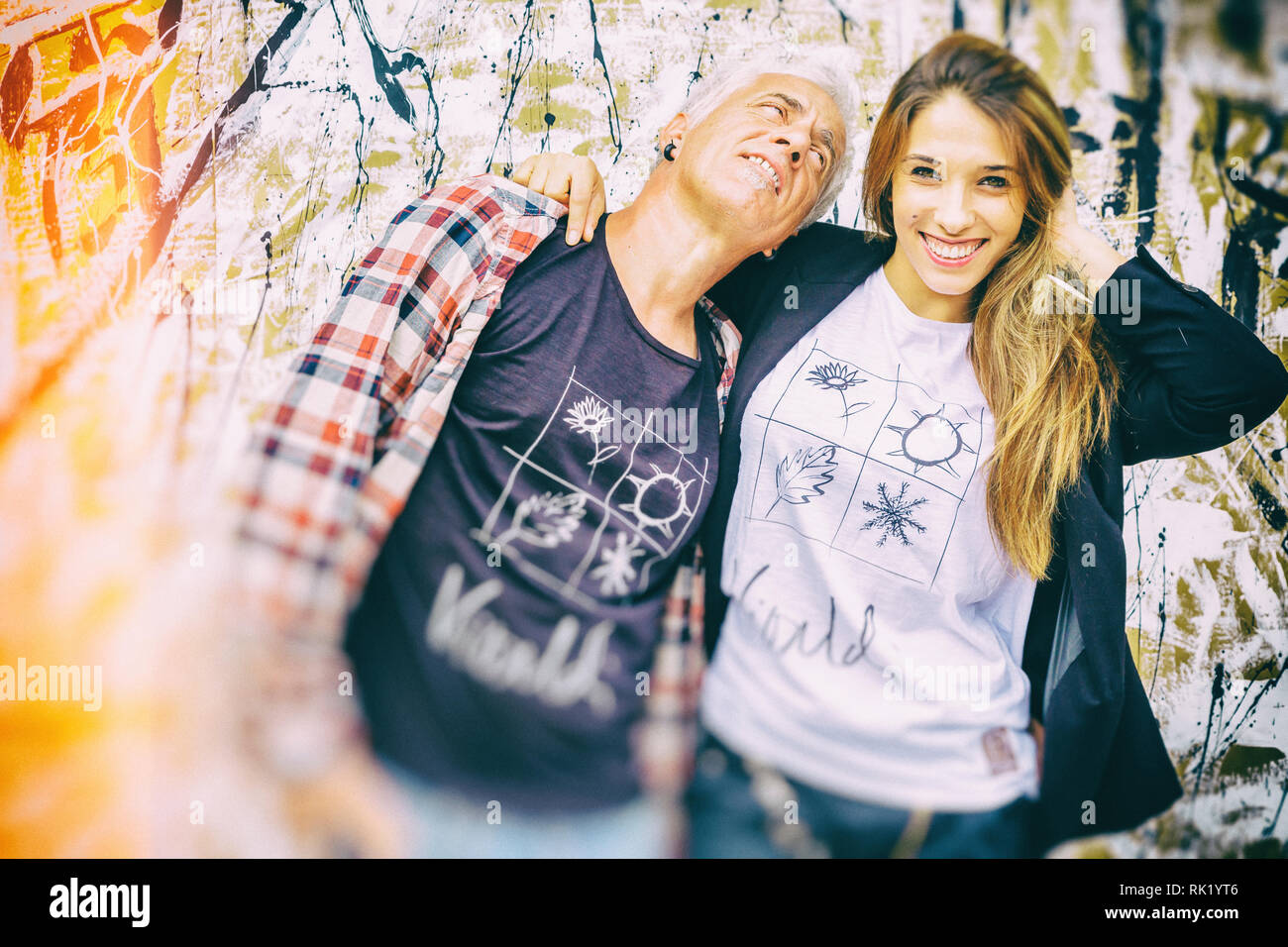 Two people posing Stock Photo - Alamy