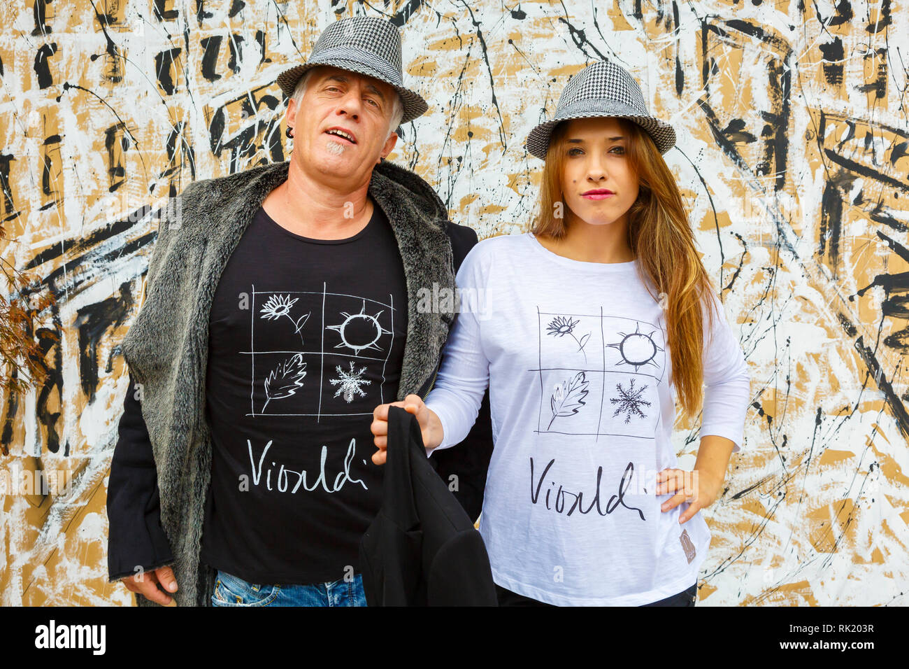 Two people posing Stock Photo - Alamy