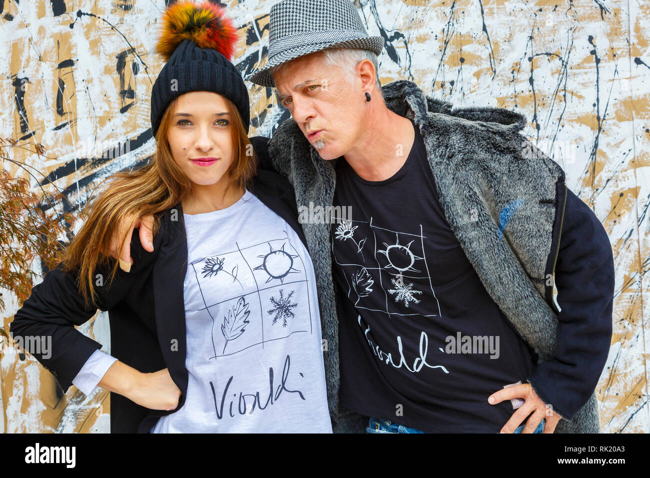 Two people posing Stock Photo - Alamy