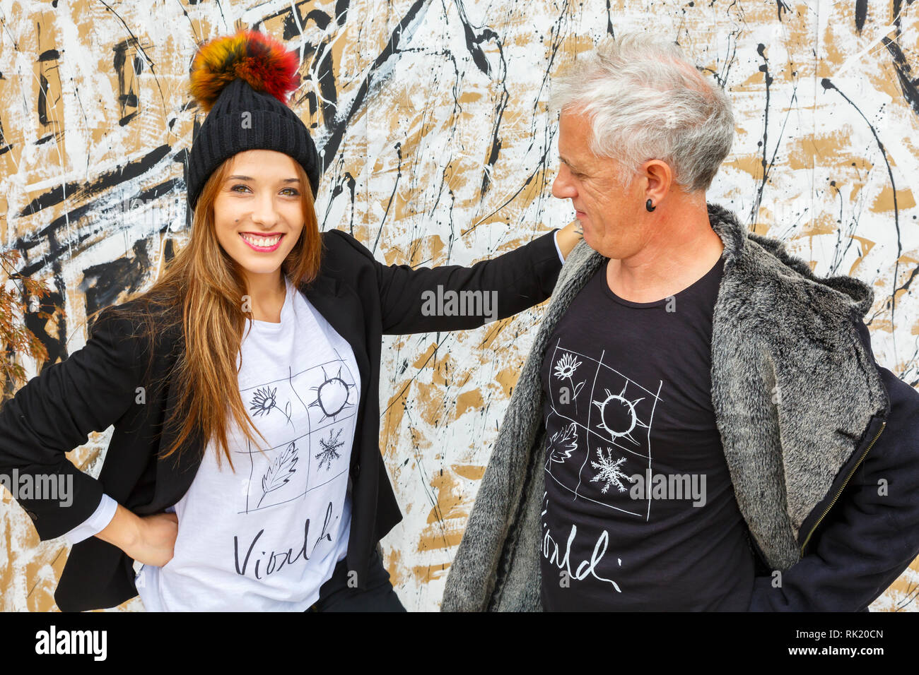 Two people posing Stock Photo - Alamy