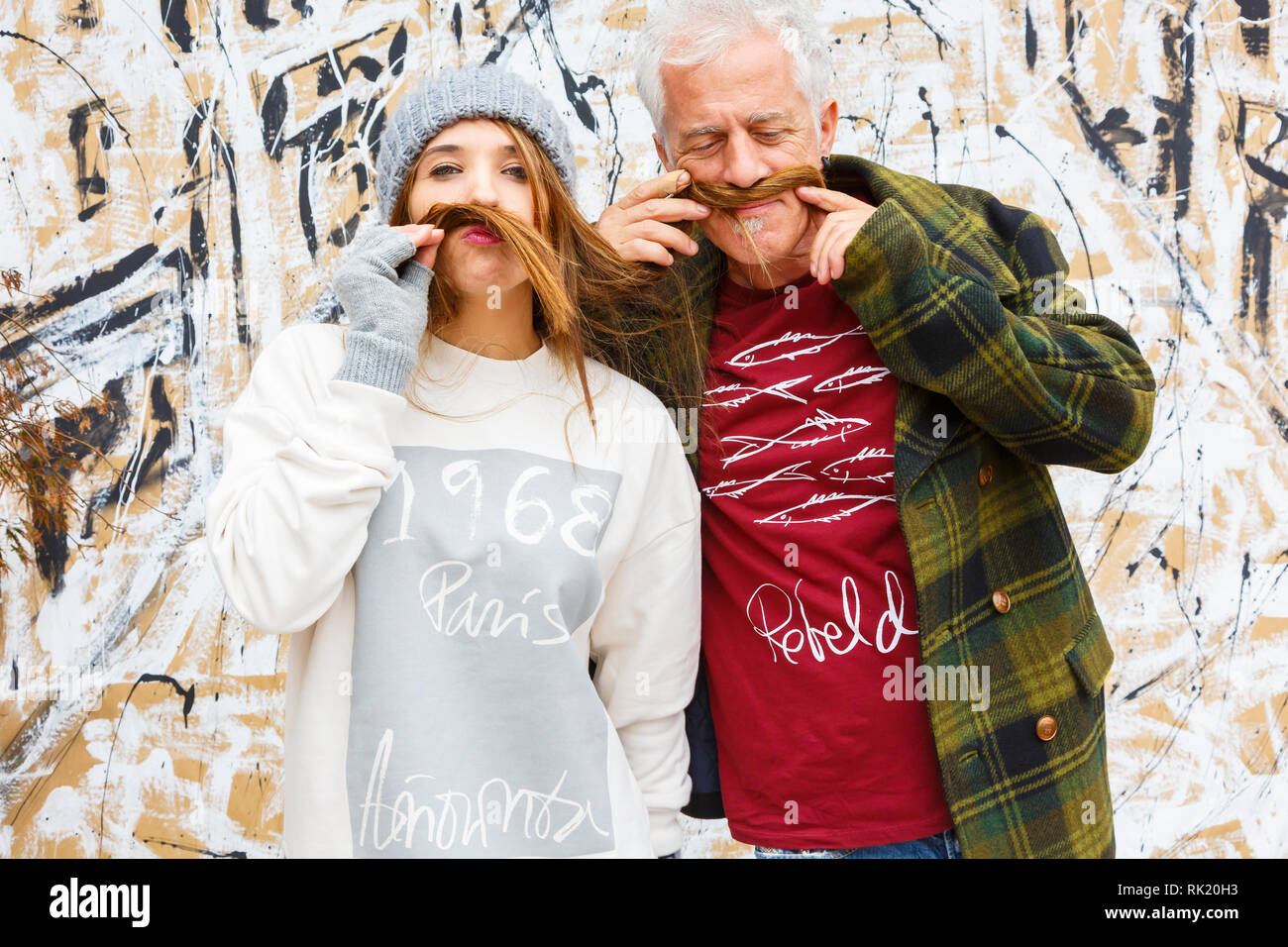 Two people posing Stock Photo - Alamy