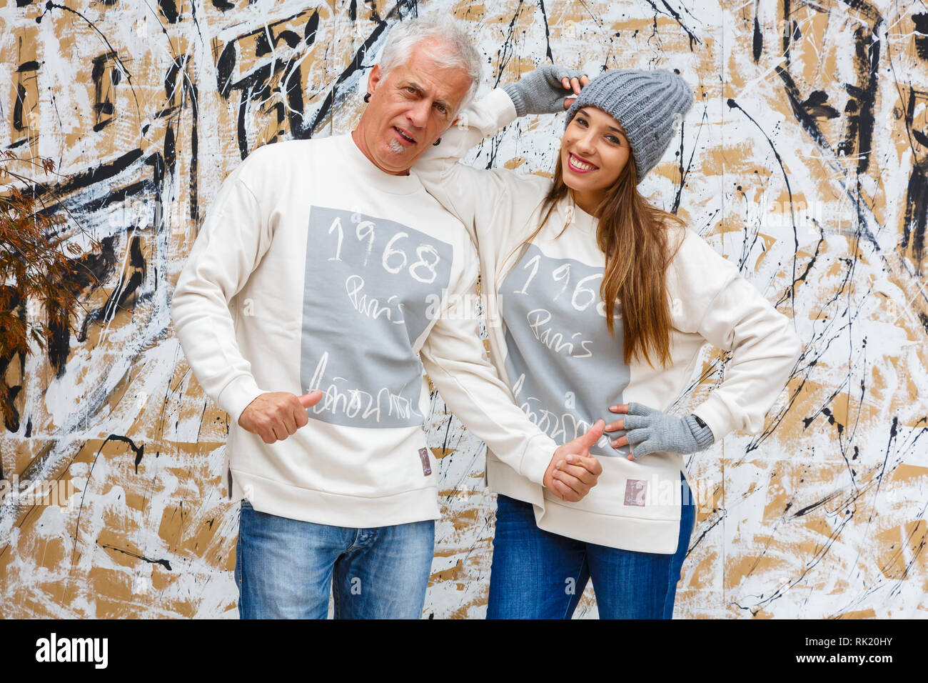 Two people posing Stock Photo - Alamy