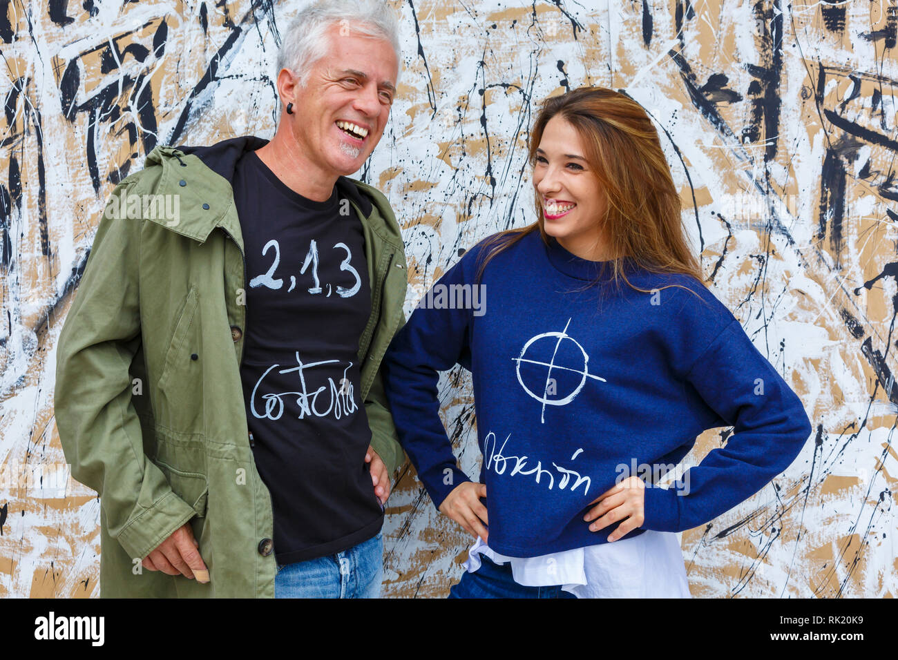Two people posing Stock Photo - Alamy