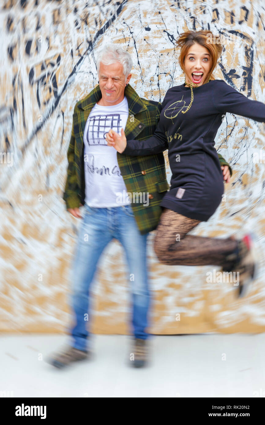 Two people posing Stock Photo - Alamy