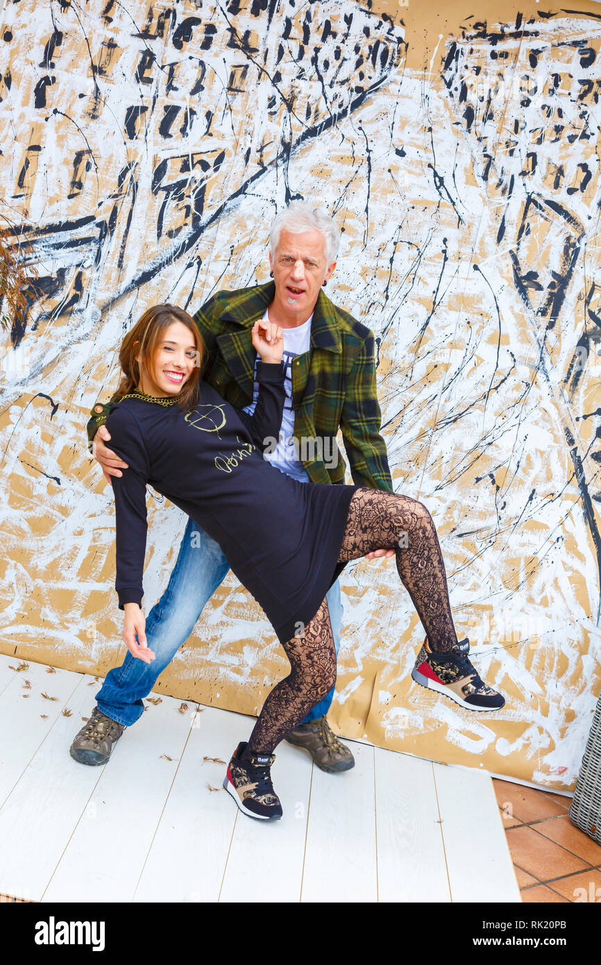 Two people posing Stock Photo - Alamy