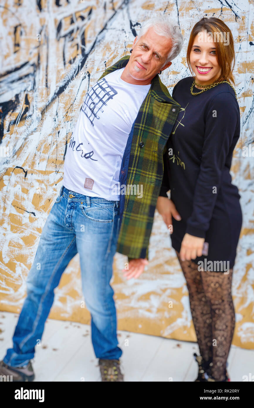 Two people posing Stock Photo - Alamy