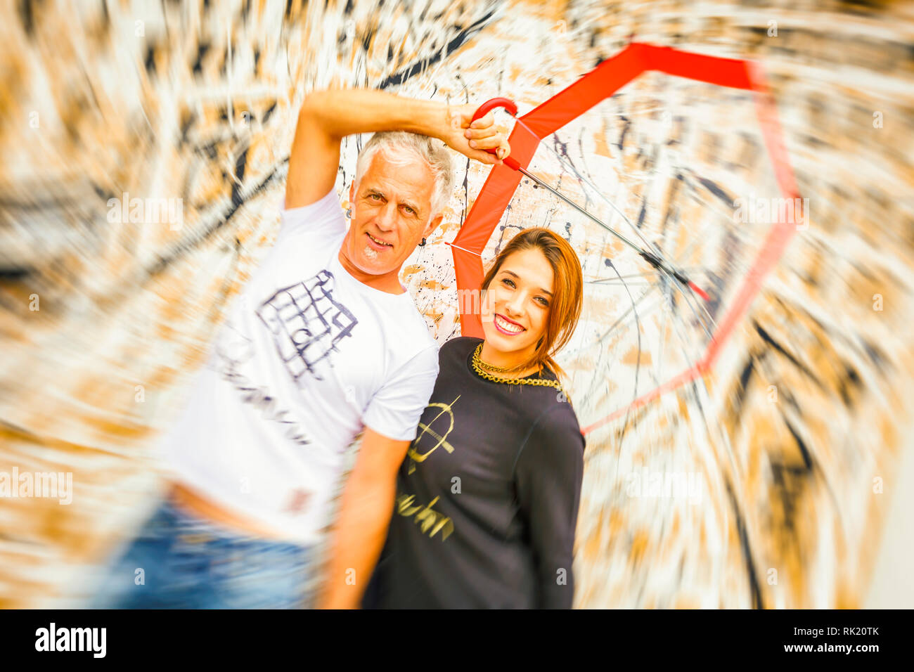 Two people posing Stock Photo - Alamy