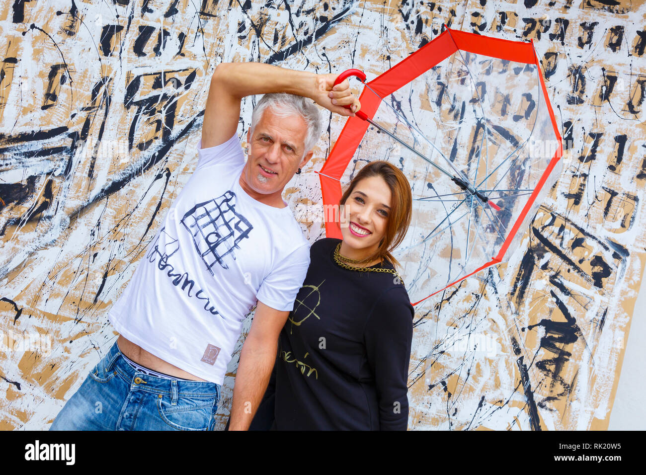 Two people posing Stock Photo - Alamy