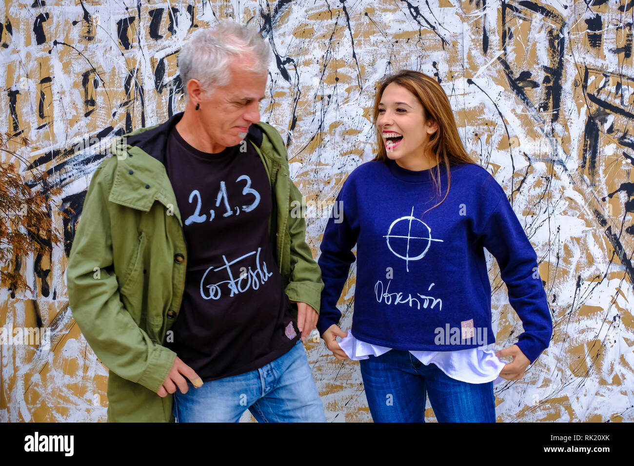 Two people posing Stock Photo - Alamy