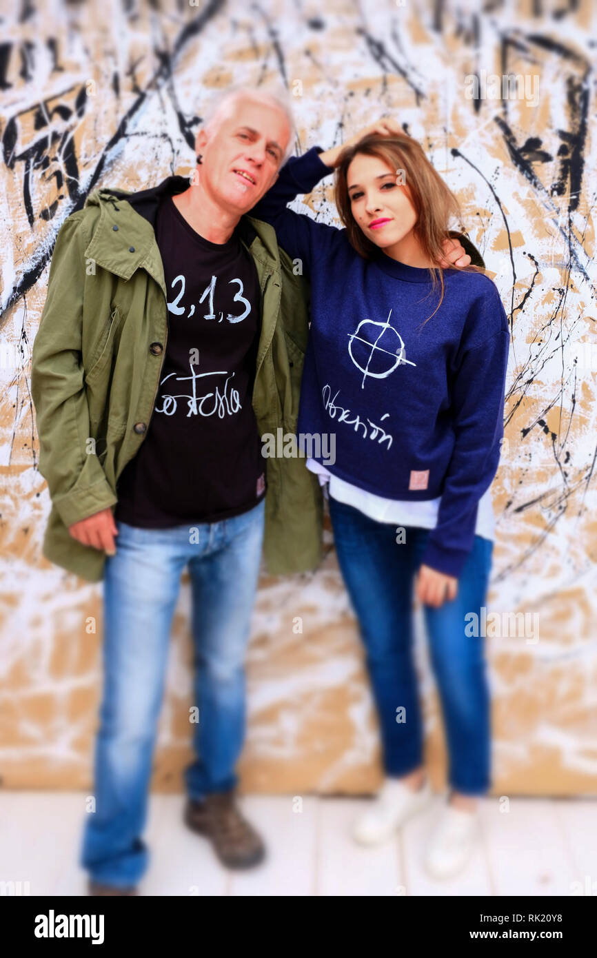Two people posing Stock Photo - Alamy