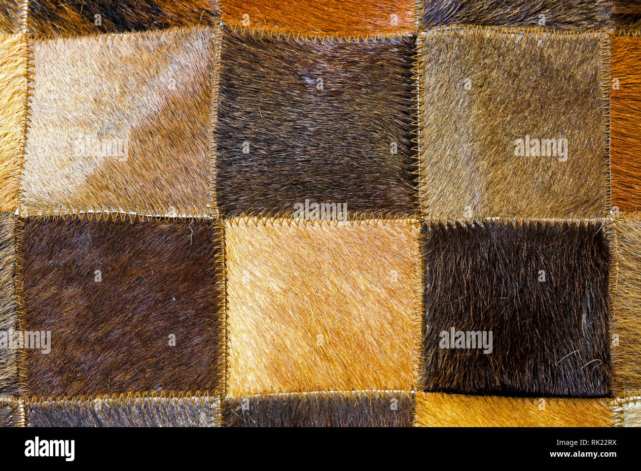 Brown animal fur made from patches and parts Stock Photo - Alamy