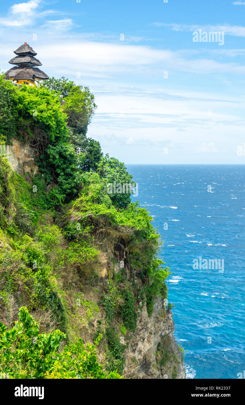 Uluwatu temple a pagoda perched on the cliffs of Bukit peninsula, Bali ...