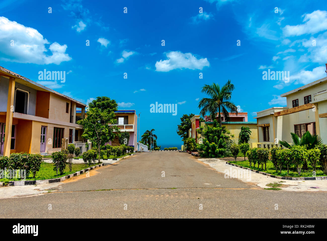 Road crossing in between two building of a colony at Indian society ...