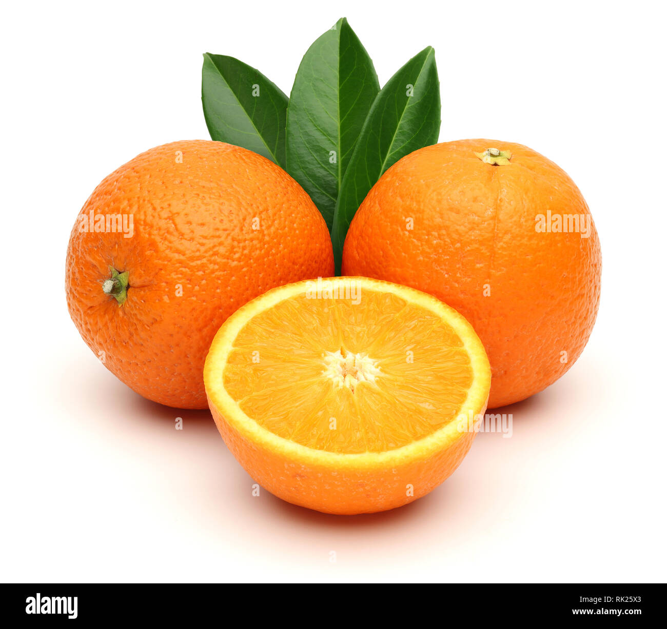 Fresh Oranges and leaves isolated on white background Stock Photo - Alamy