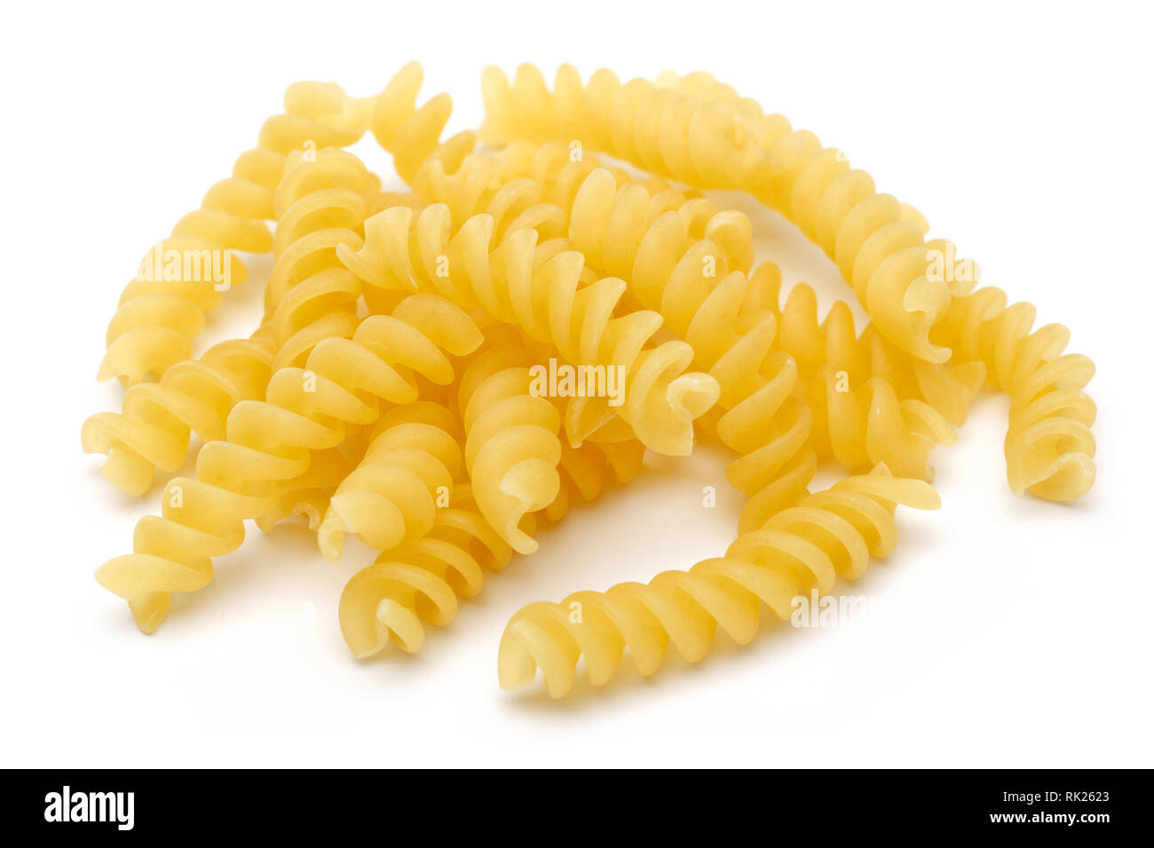 Fusilli pasta isolated on white background Stock Photo - Alamy