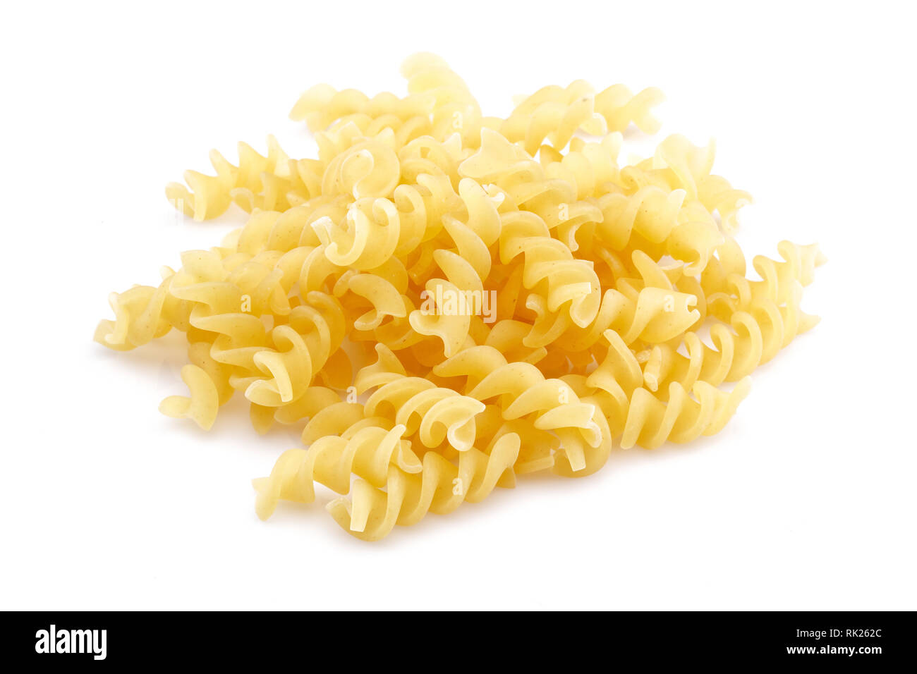 Fusilli pasta isolated on white background Stock Photo - Alamy