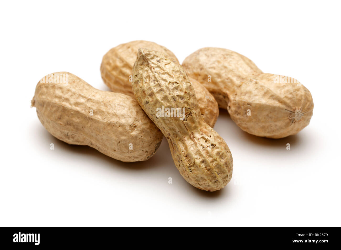 Peanuts isolated on white background, macro shot Stock Photo - Alamy