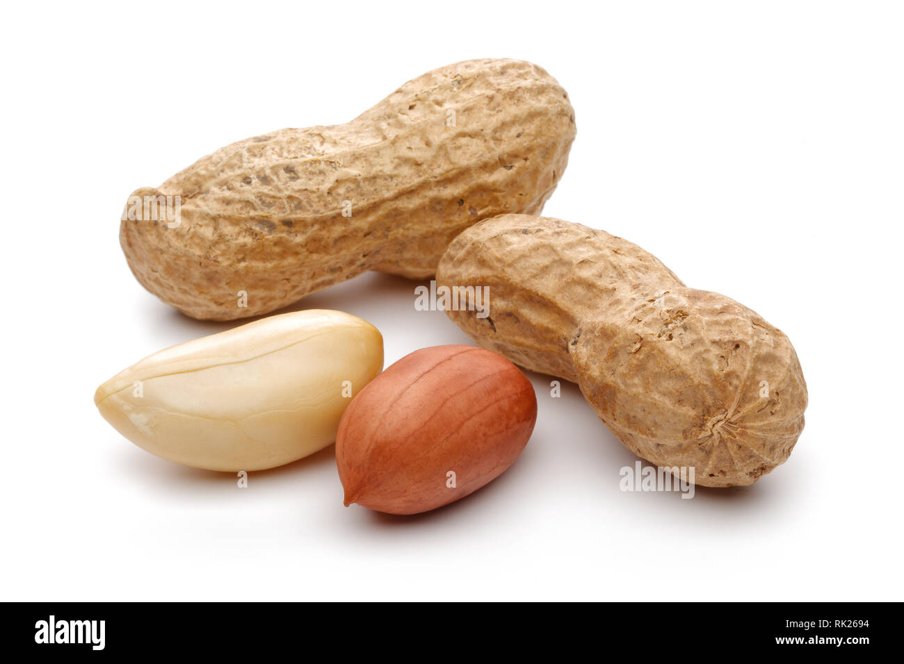 Peanuts isolated on white background, macro shot Stock Photo - Alamy