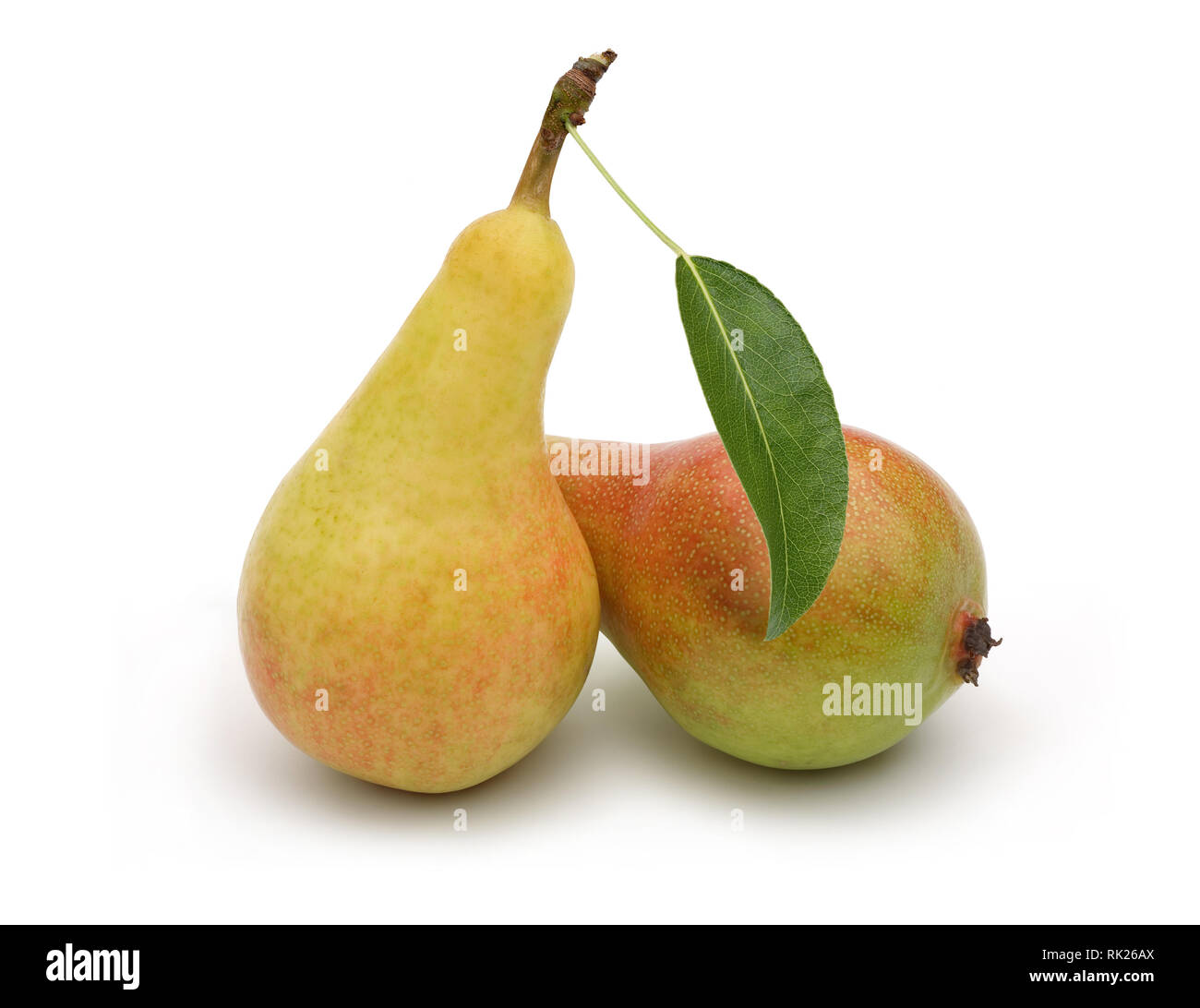 Fresh pear and leaf isolated on white background Stock Photo - Alamy